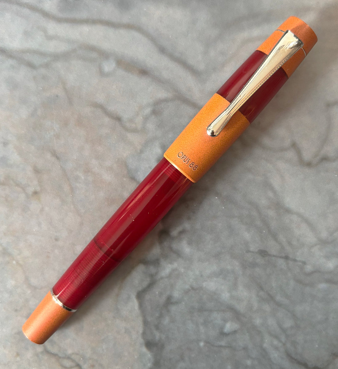 Opus 88 KOLORO Red translucent plastic, and Ebonite